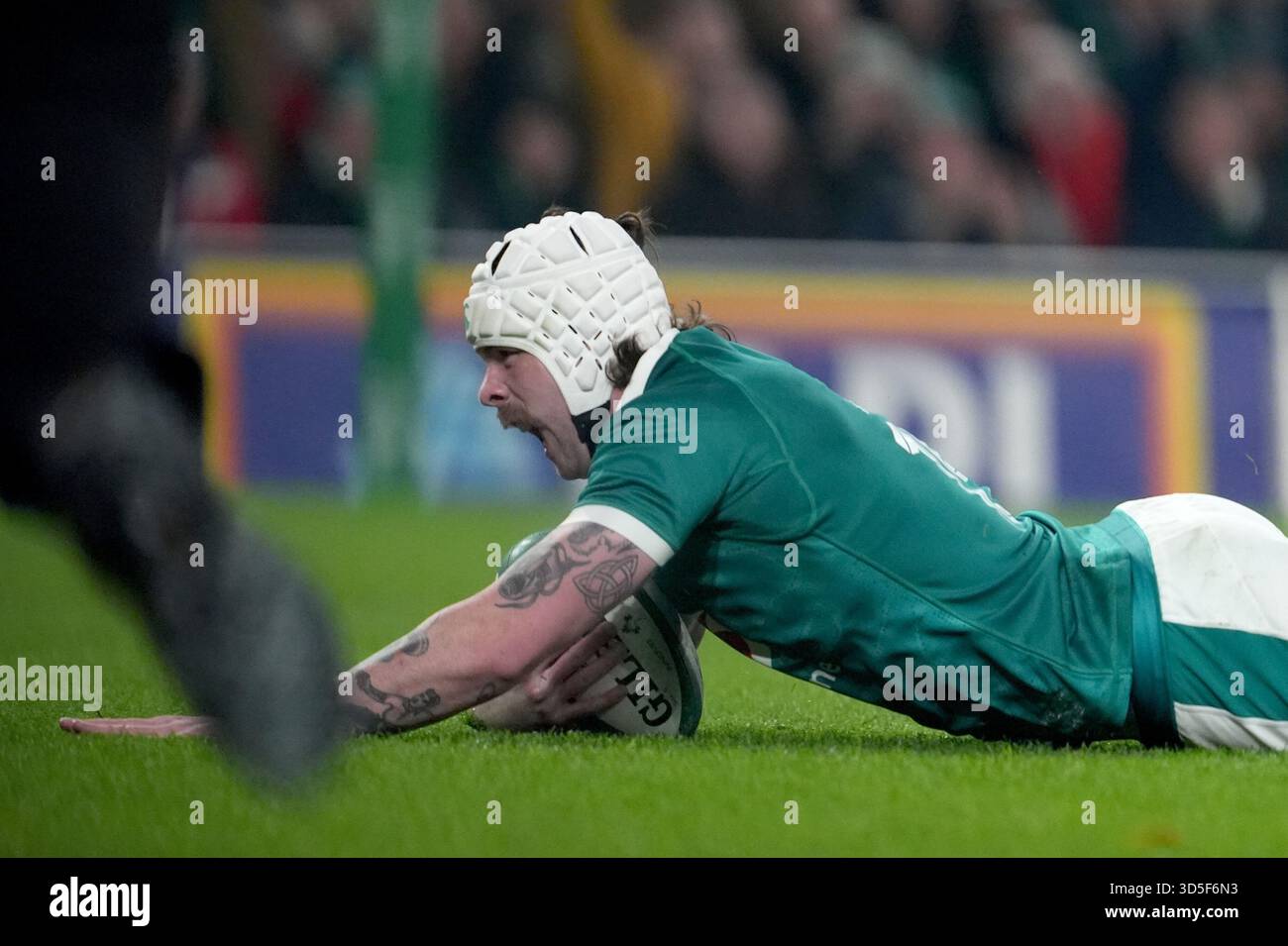 Ireland's Mack Hansen scores their sides first try of the game during ...