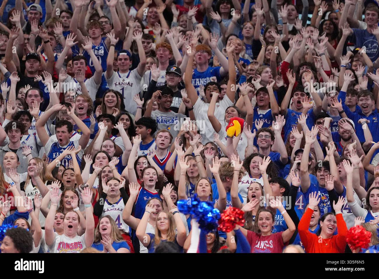Kansas fans celebrate after a basket during the first half of an NCAA ...