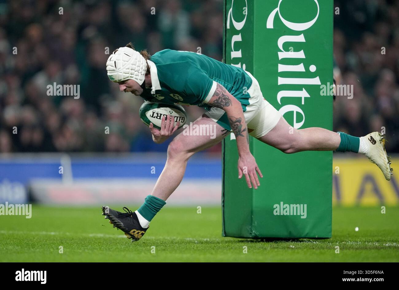 Ireland's Mack Hansen scores their sides first try of the game during ...