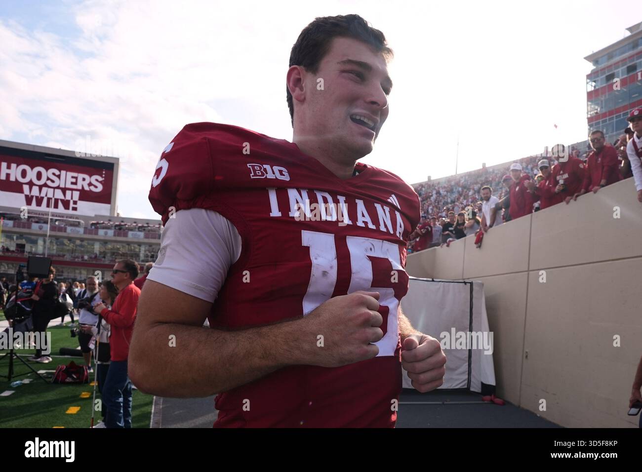 Indiana quarterback Fernando Mendoza runs off the field following an ...
