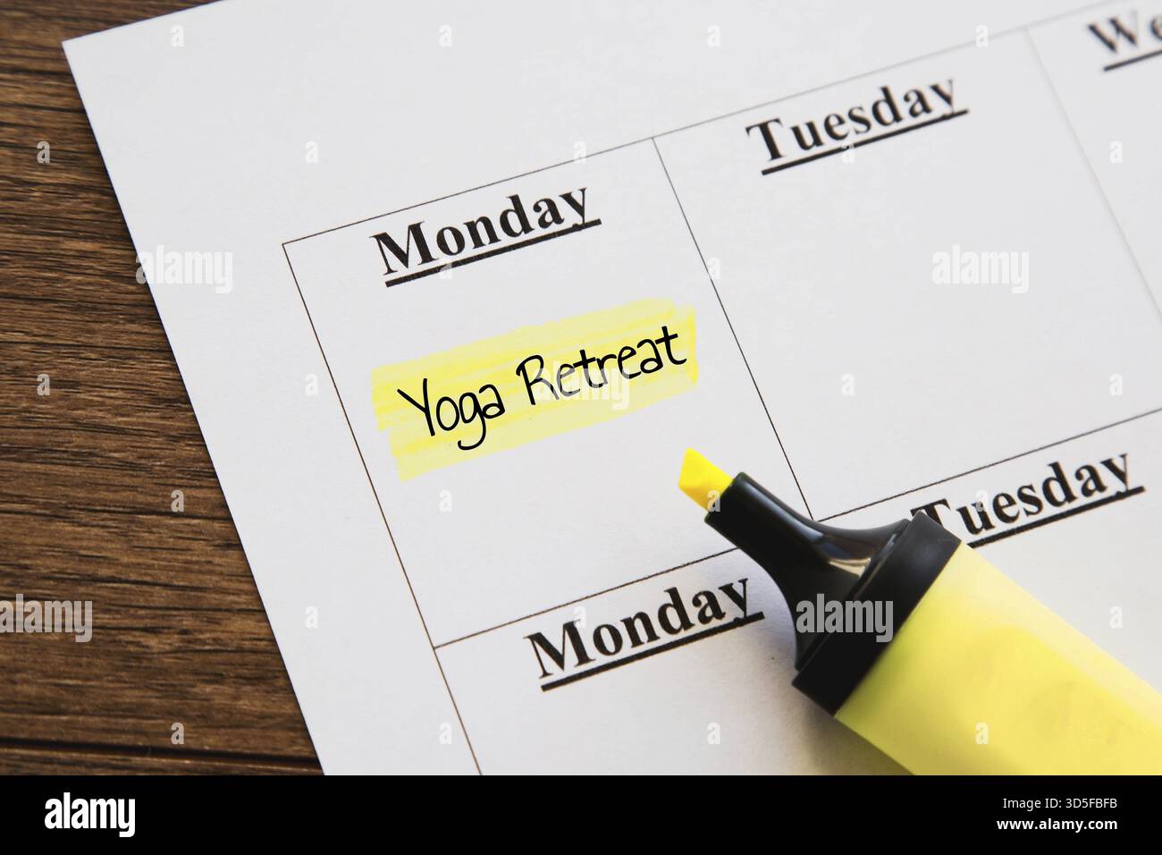 Yoga retreat reminder highlighted in yellow on weekly planner with ...