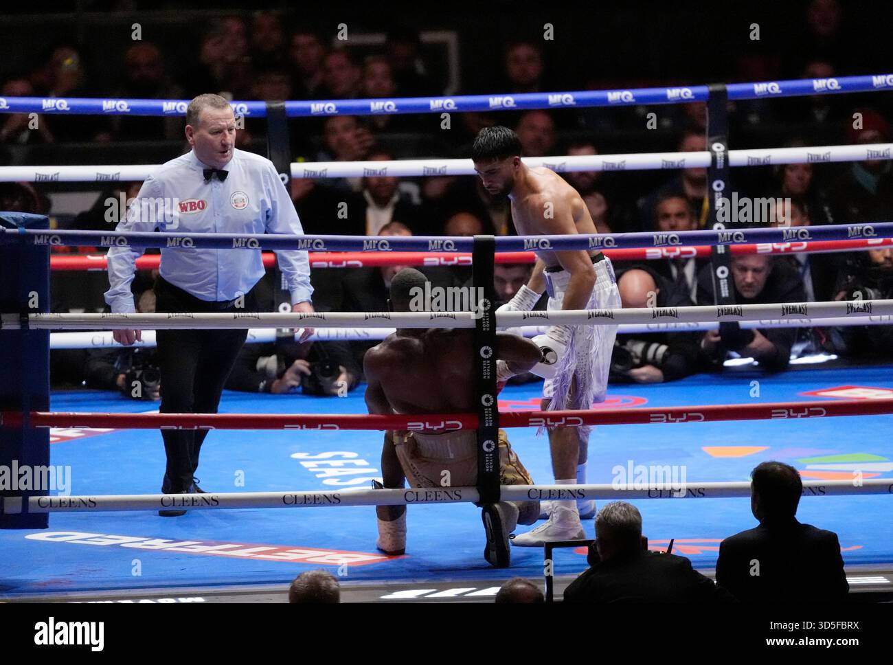 Adam Azim in action against Kurt Scoby before a stoppage in the 12th ...