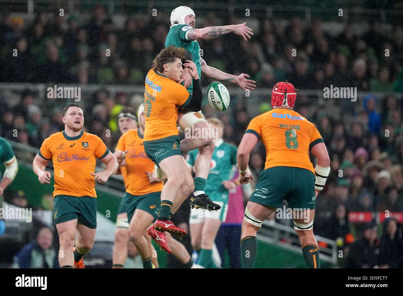 Australia's James O'Connor and Ireland's Mack Hansen battle for the ...