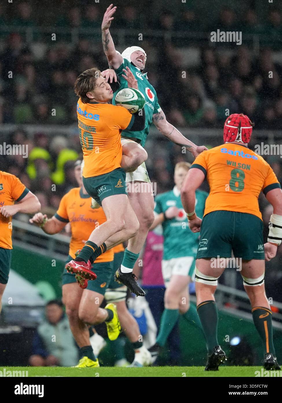 Australia's James O'Connor and Ireland's Mack Hansen battle for the ...