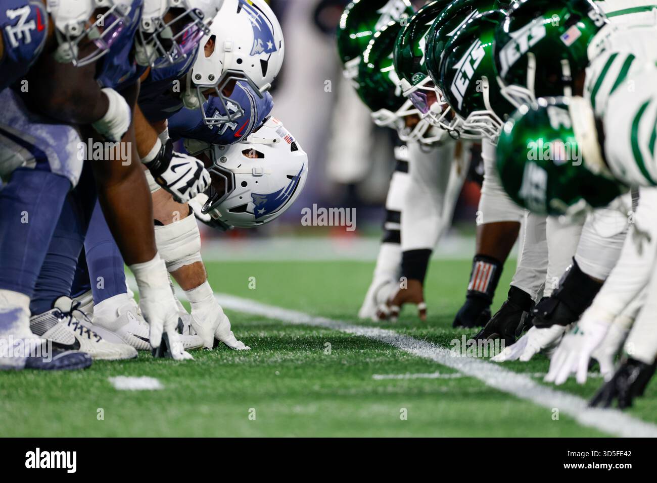 The New England Patriots line up against the New York Jets during the ...