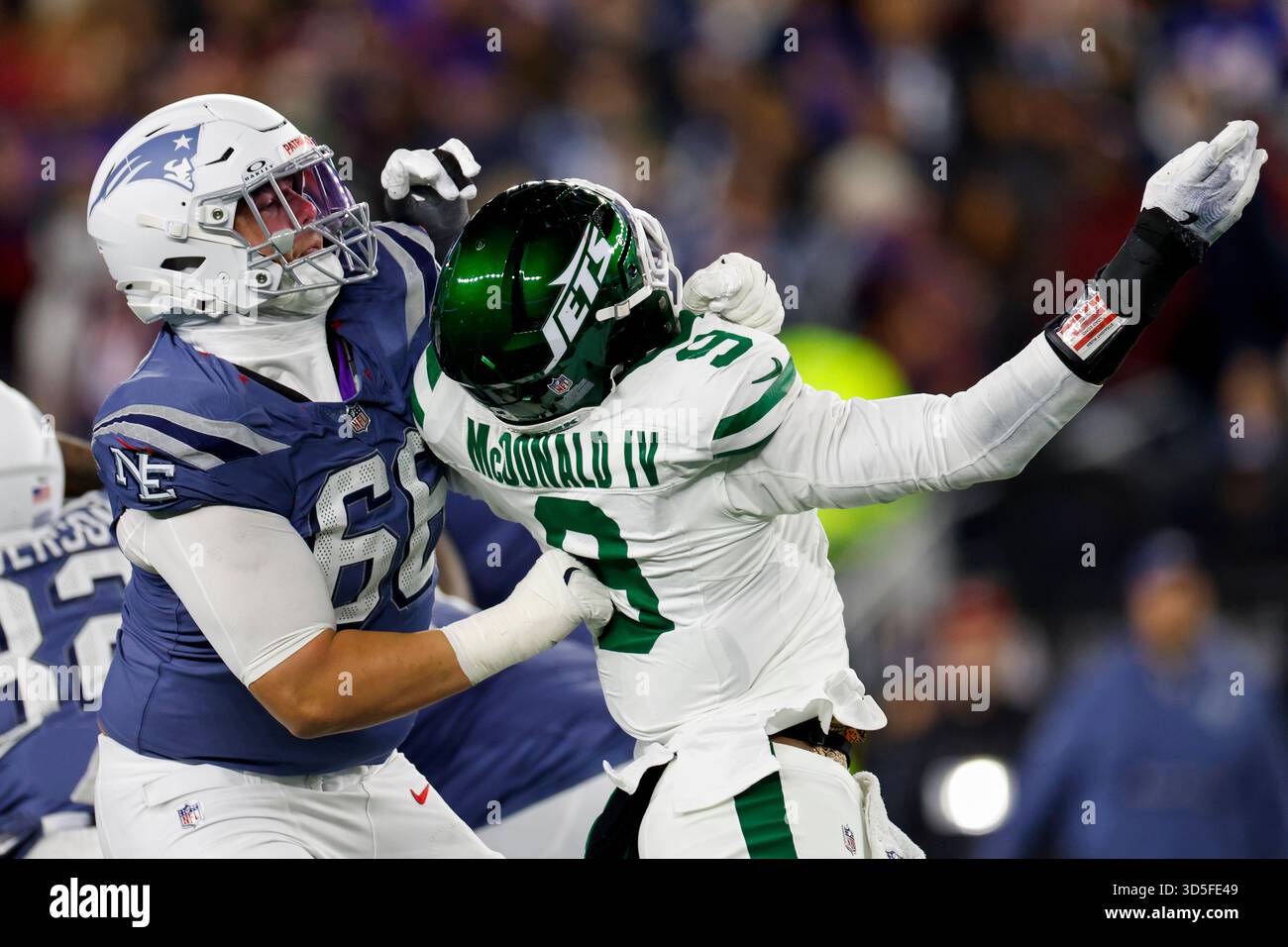 New England Patriots offensive tackle Will Campbell (66) battles with ...