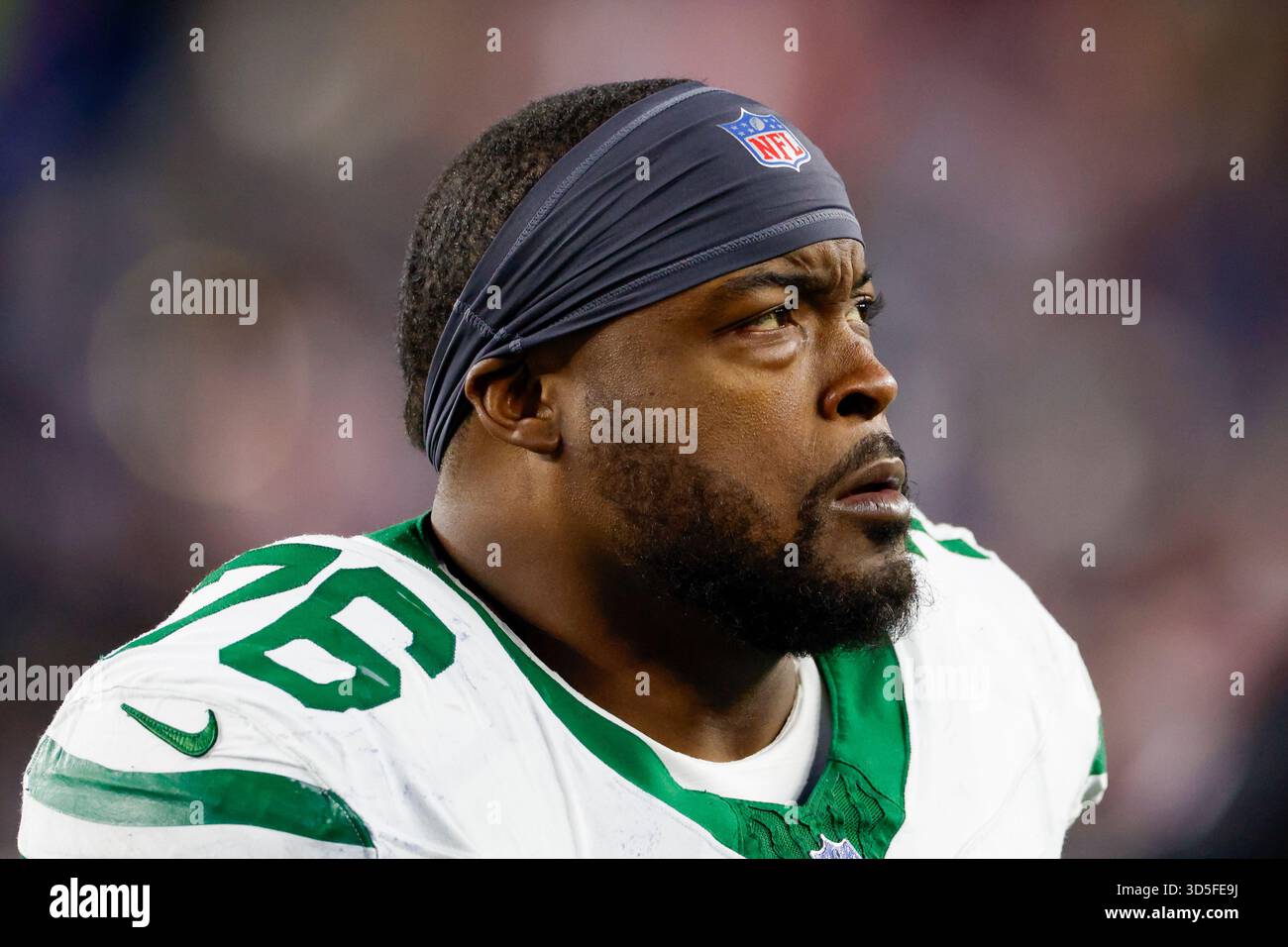New York Jets guard John Simpson (76) reacts during the first half of ...