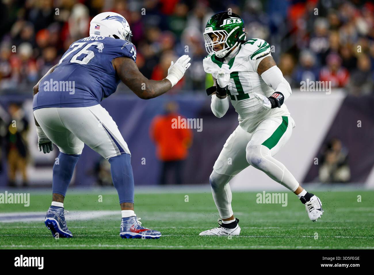 New York Jets linebacker Jermaine Johnson II (11) battles with New ...