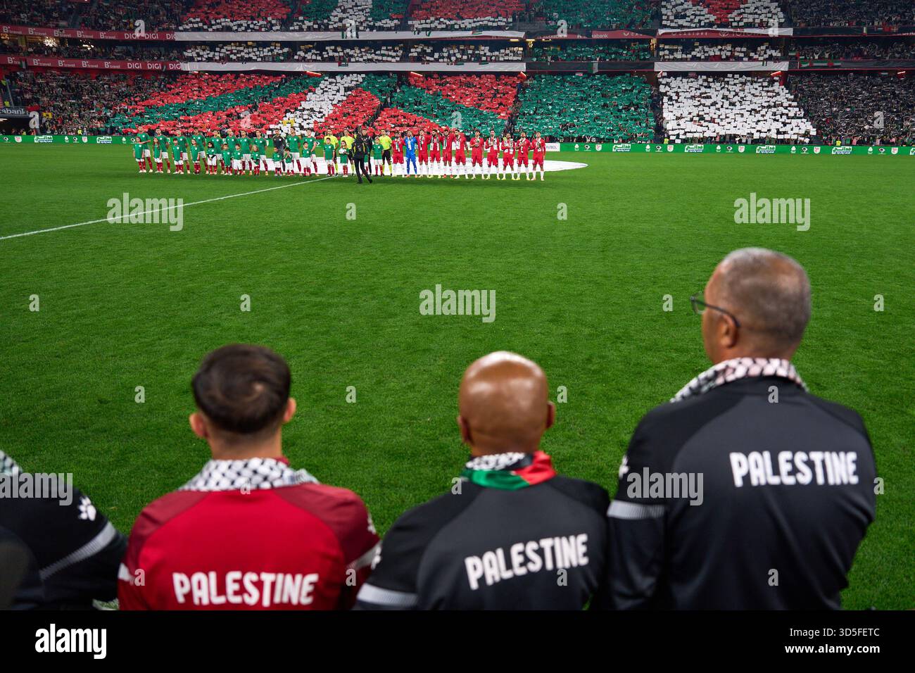 Palestinian players and Spanish players from the Basque Country line up ...