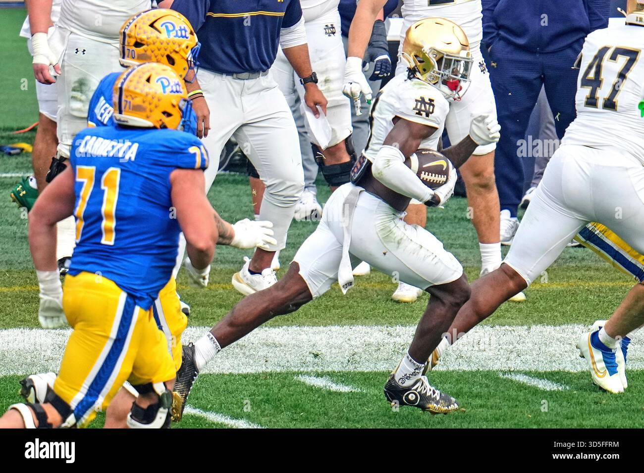 Notre Dame safety Adon Shuler, center, returns an interception for a ...
