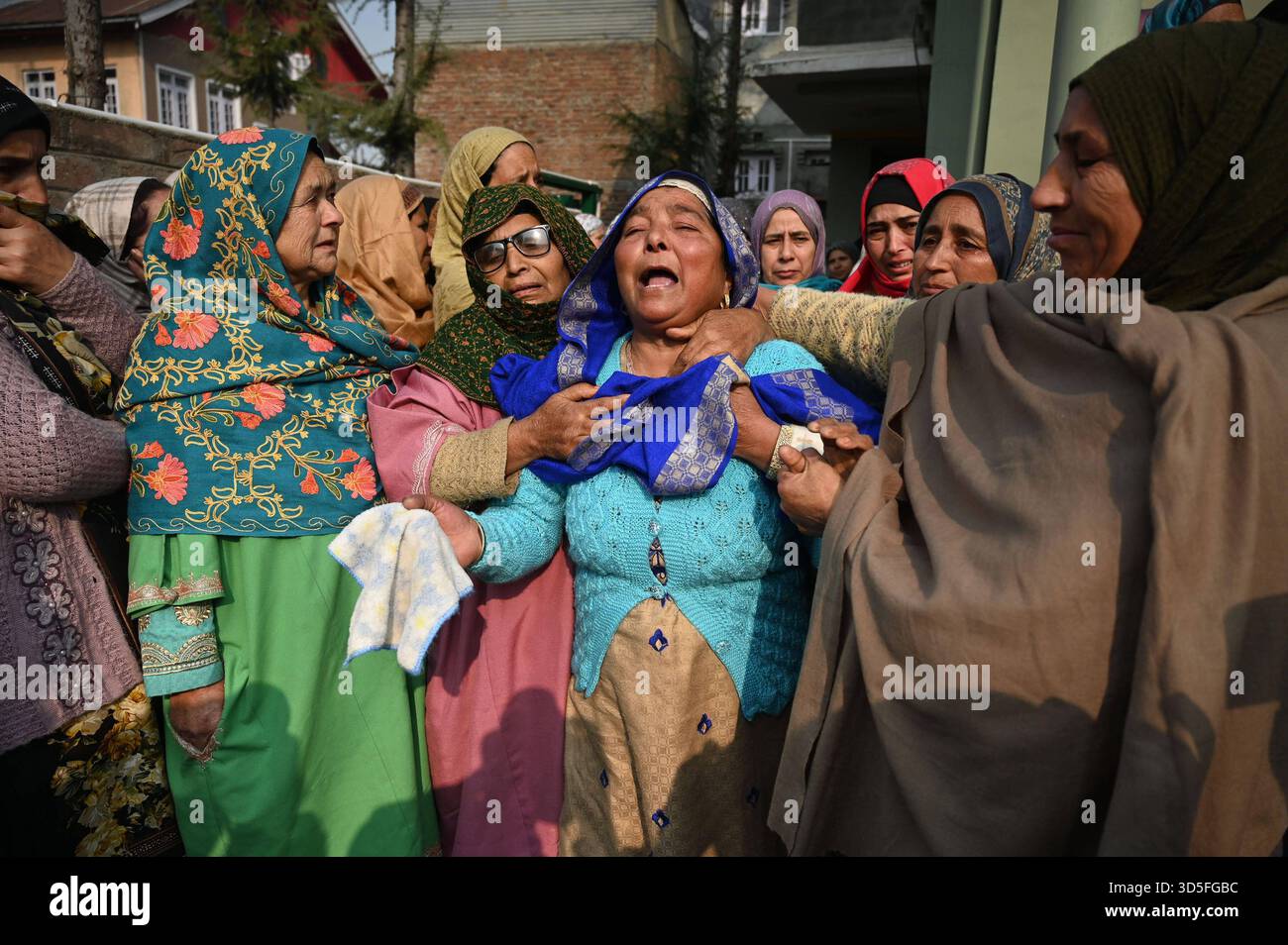 SRINAGAR, INDIA - NOVEMBER 15: Relatives of Mohammad Shafi Parry, a ...