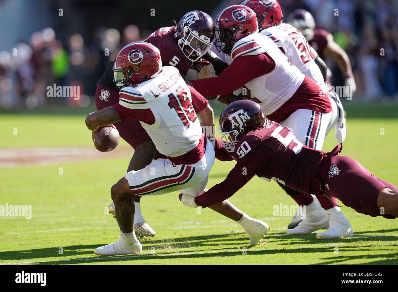 South Carolina quarterback Lanorris Sellers (16) is sacked by Texas A&M ...