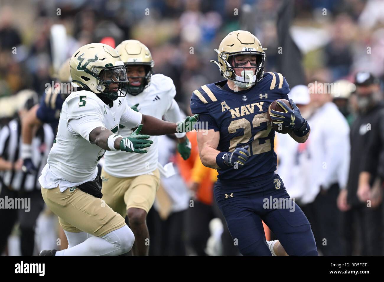 Navy running back Eli Heidenreich (22) runs for the end zone as South ...