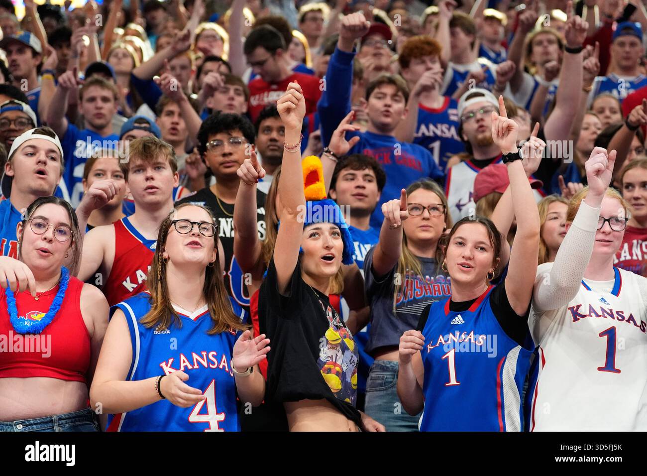 Kansas fans cheer before an NCAA college basketball game against ...
