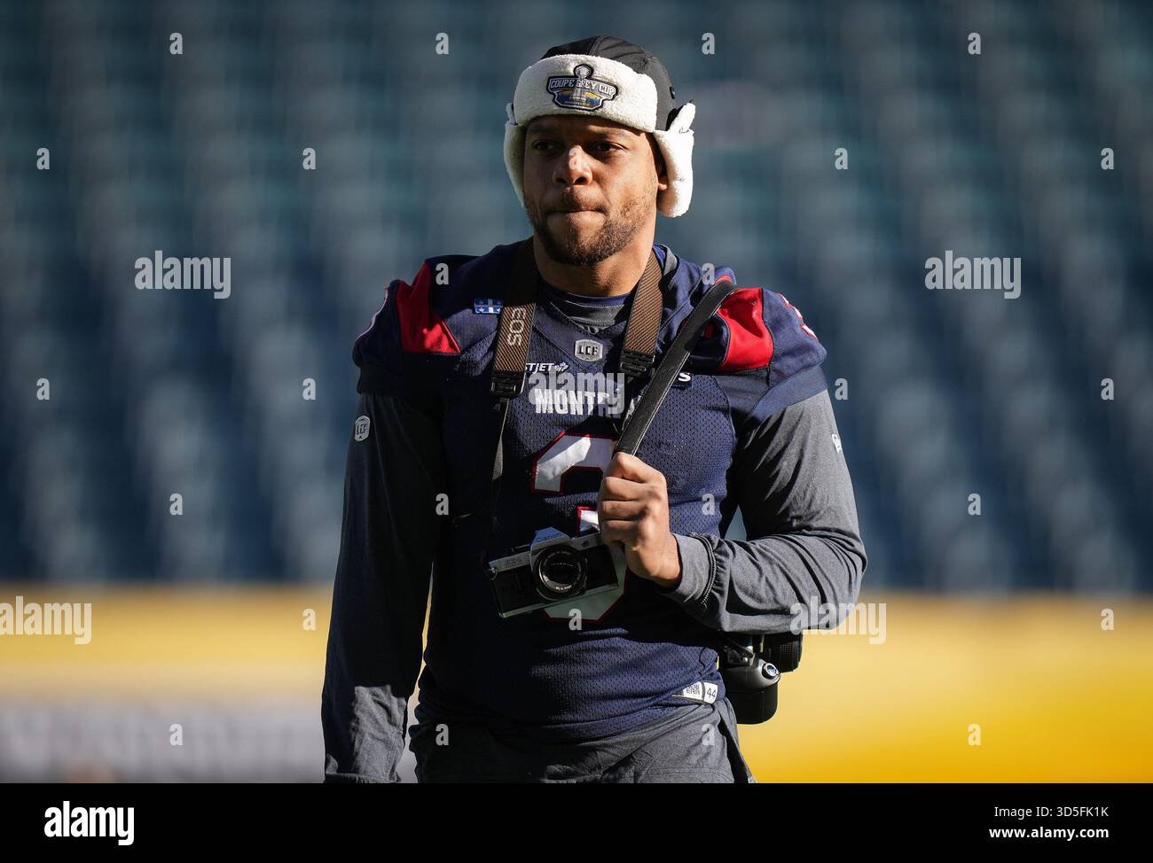 Montreal Alouettes' Regis Cibasu carries cameras during a walkthrough ...