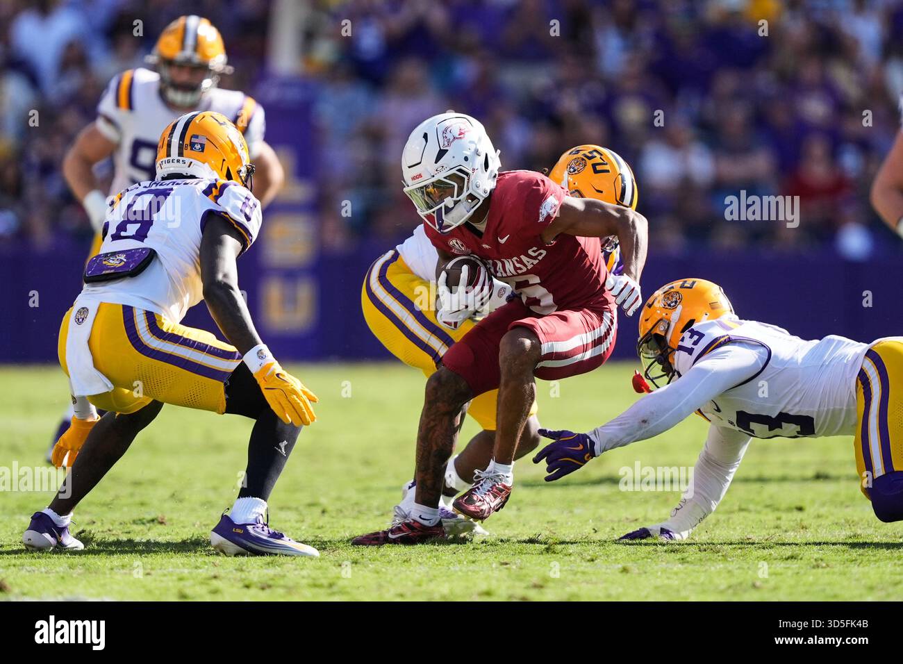 Arkansas wide receiver Raylen Sharpe (6) carries between LSU cornerback ...