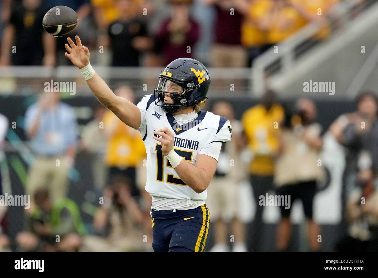 West Virginia quarterback Scotty Fox Jr. throws against Arizona State ...