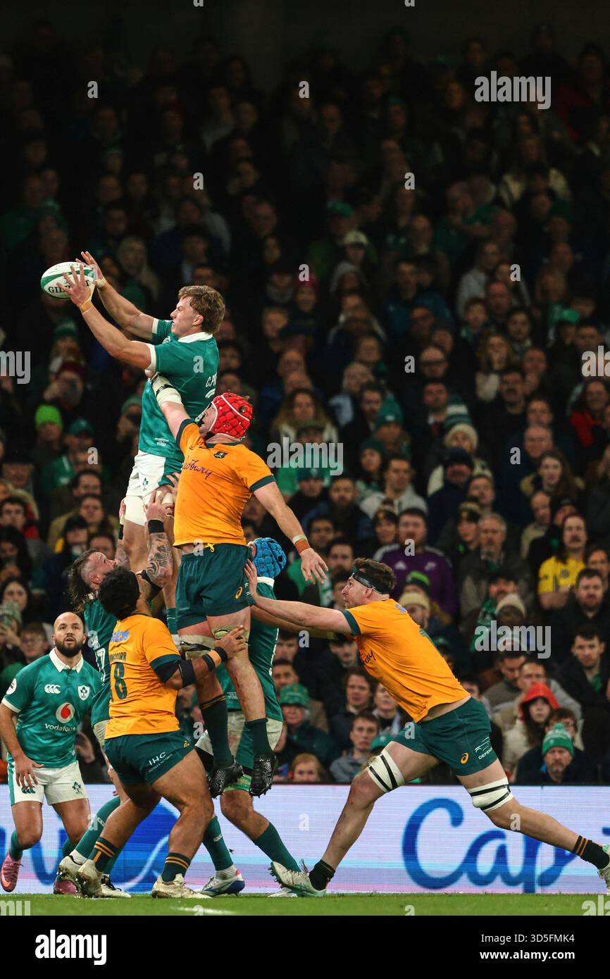 Ireland's Nick Timoney, top left, wins a line out against Australia's ...