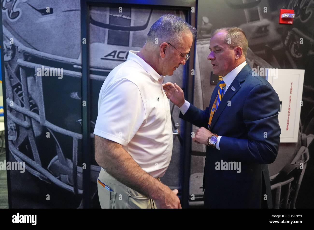 ACC Commissioner James J. Phillips, right, visits with Pittsburgh head ...