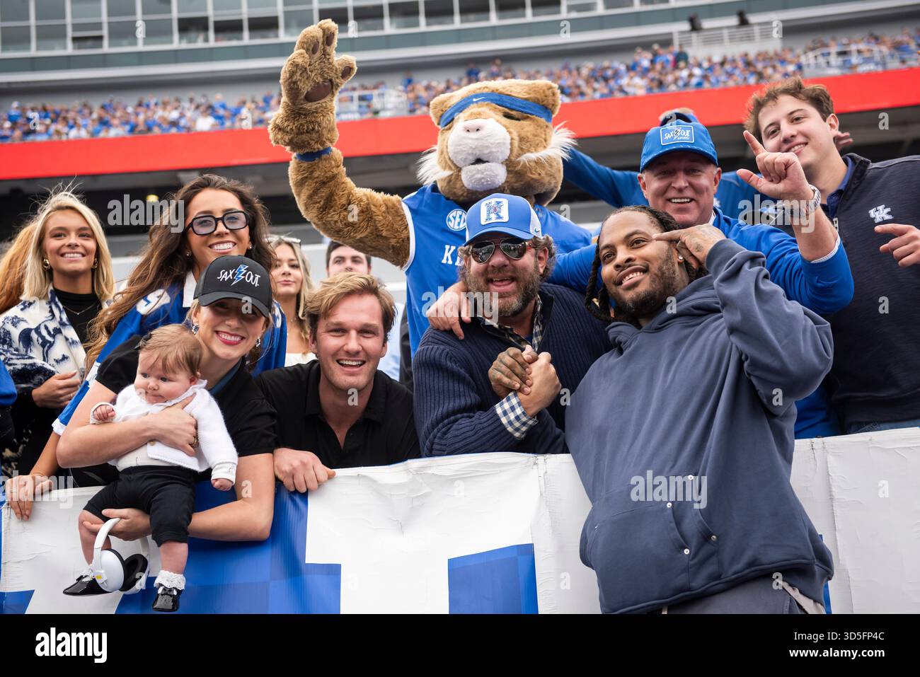 Rapper Waka Flocka Flame poses with Kentucky fans during the second ...