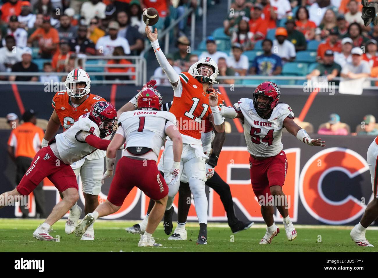 Miami quarterback Carson Beck (11) passes the football during the first ...