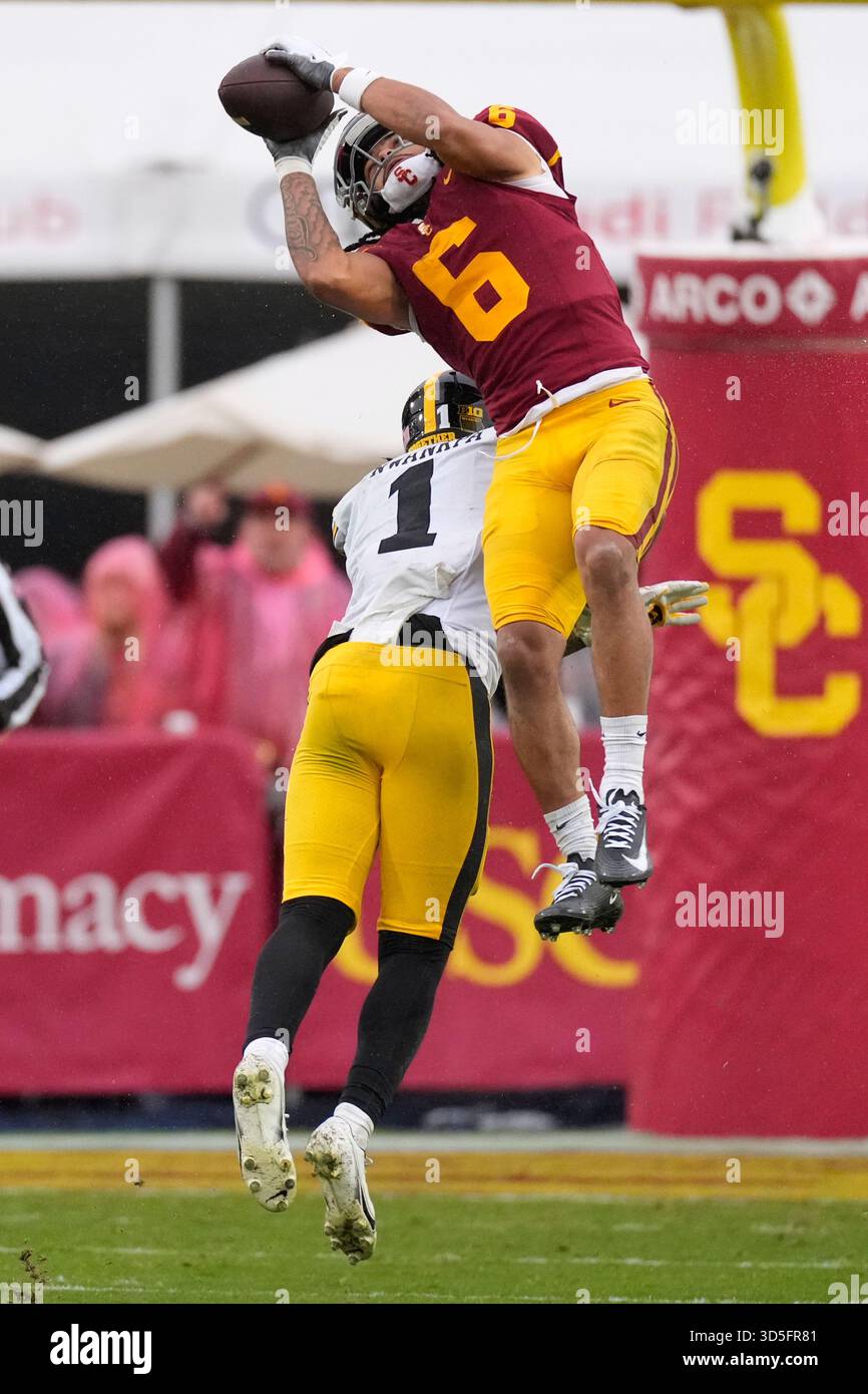 Southern California wide receiver Makai Lemon, top, makes a catch as ...