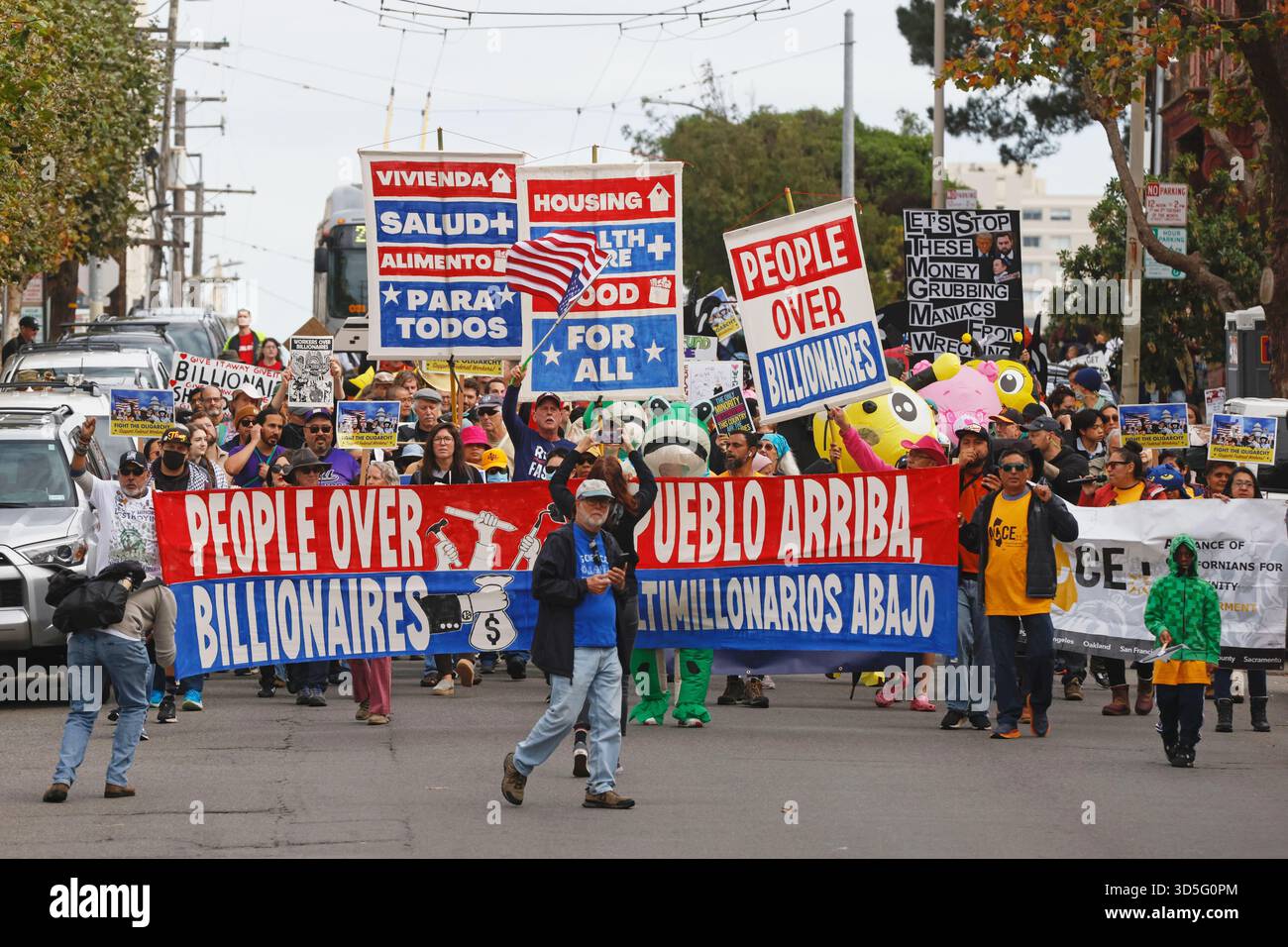 People march during a People Over Billionaires protest in the Pacific ...