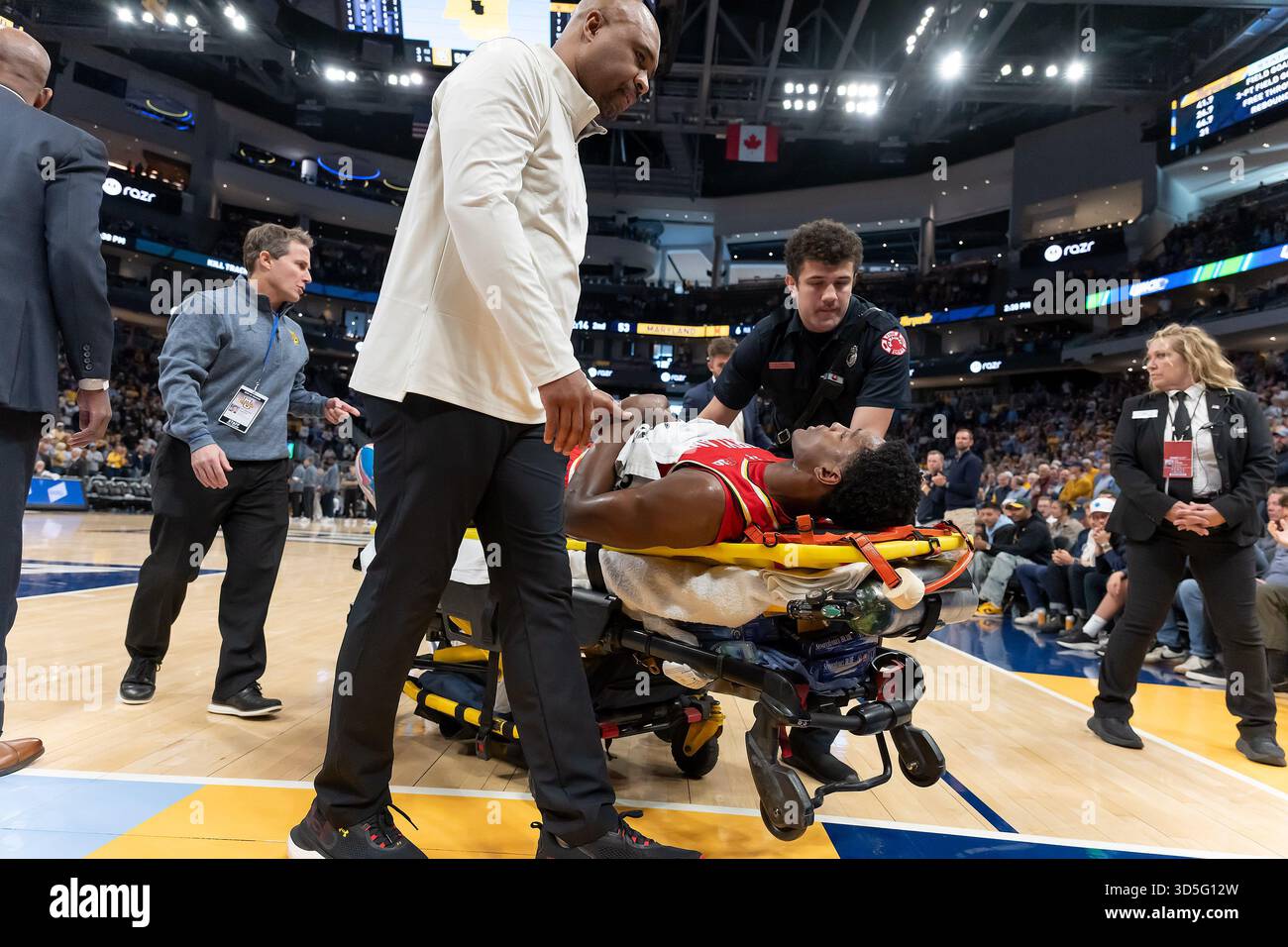 Milwaukee, WI, USA. 15th Nov, 2025. Trainer Eddie Benion walks Maryland ...