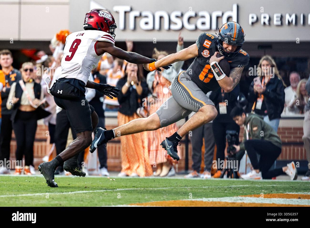 Tennessee quarterback Joey Aguilar (6) runs for a touchdown in front of ...