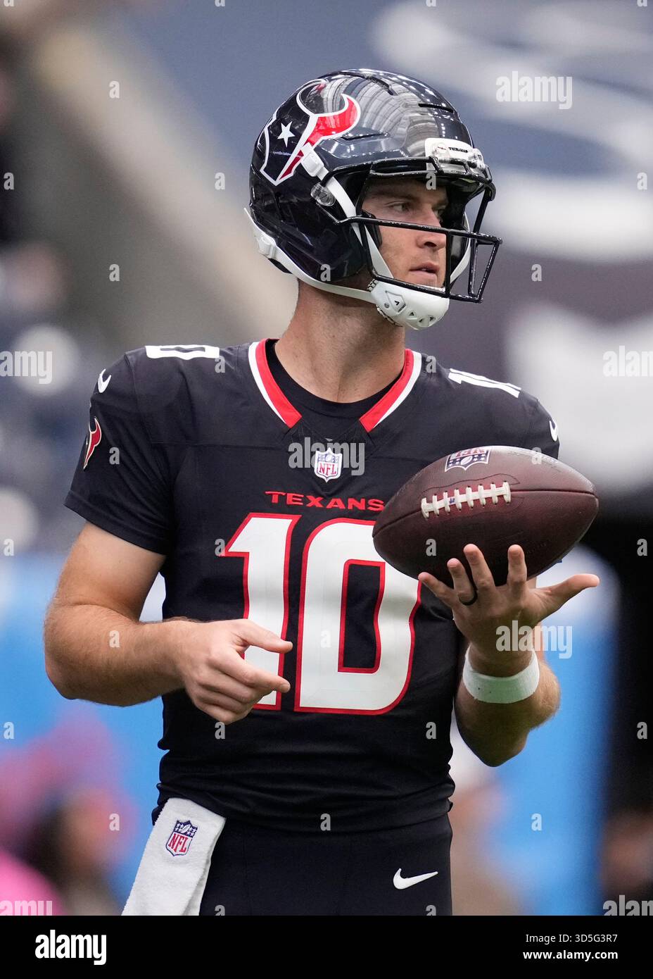 Houston Texans quarterback Davis Mills warms up before an NFL football ...