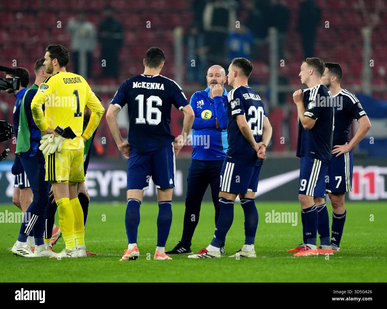 Scotland manager Steve Clarke (centre rear) on the pitch with his ...