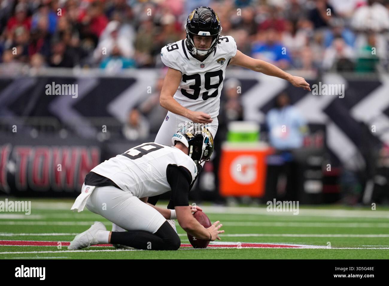 Jacksonville Jaguars kicker Cam Little kicks during an NFL football ...