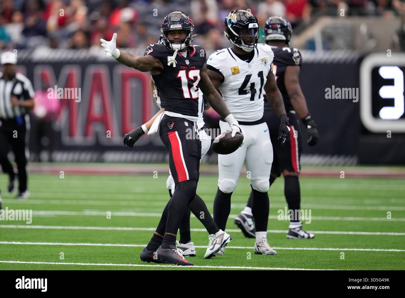 Houston Texans wide receiver Nico Collins (12) celebrates after a first ...