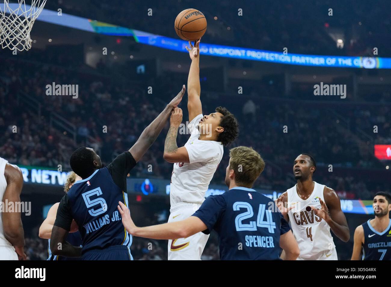 Cleveland Cavaliers guard Craig Porter Jr., center, shoots between ...