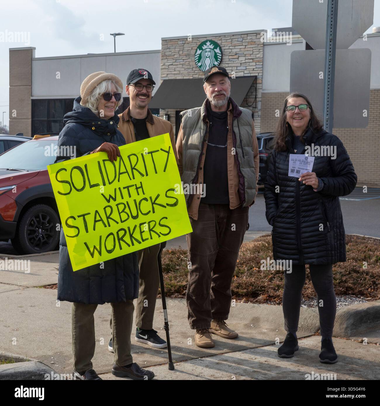 Detroit, Michigan USA - 15 November 2025 - People picket a Starbucks store in solidarity with a ...