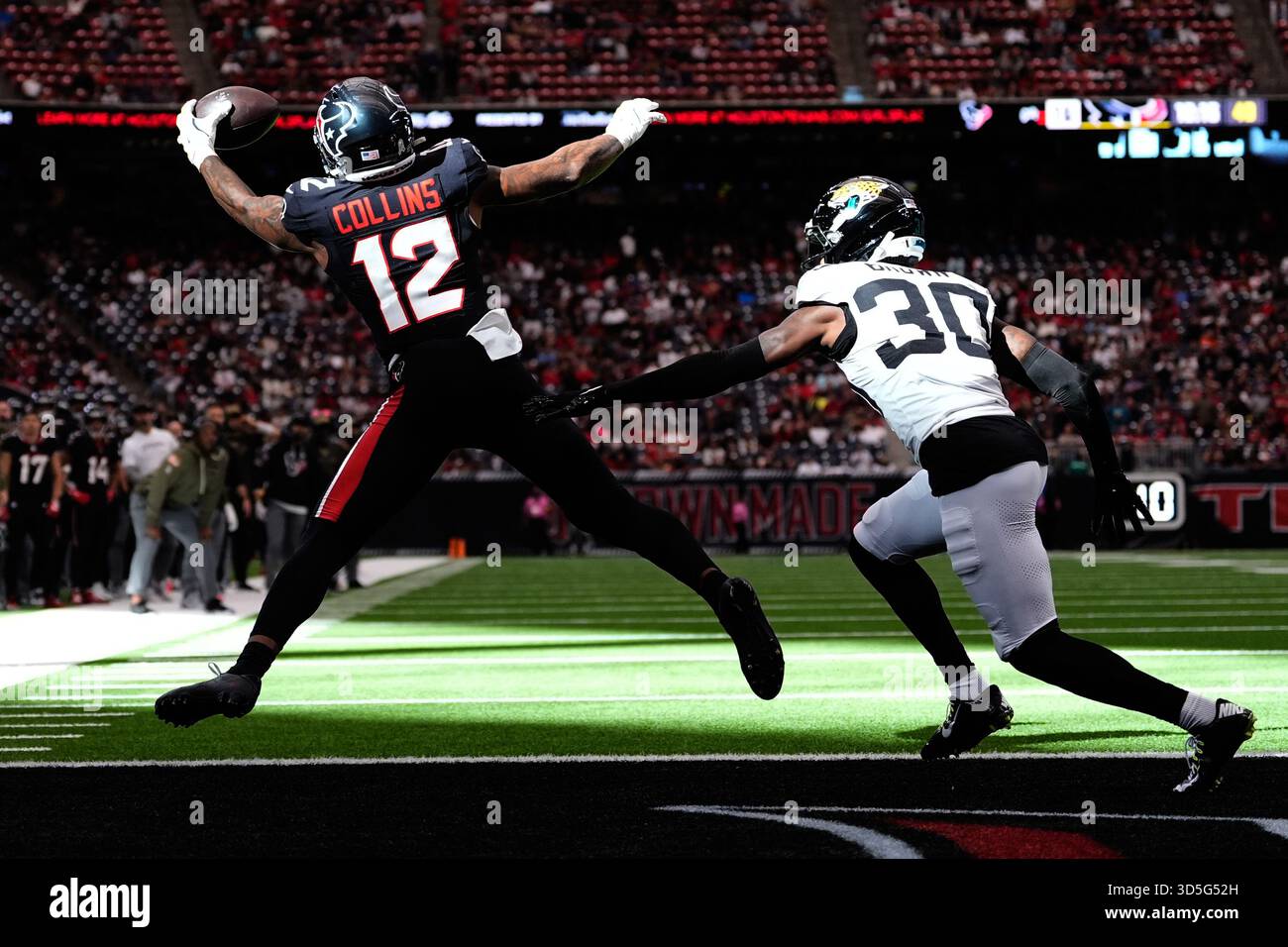Houston Texans wide receiver Nico Collins (12) catches a pass against ...