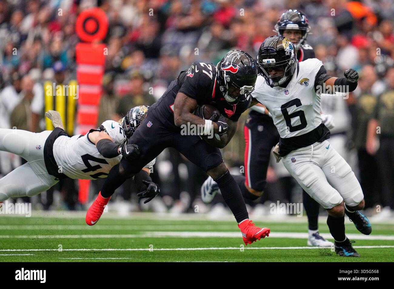 Jacksonville Jaguars safety Andrew Wingard (42) and cornerback Greg ...