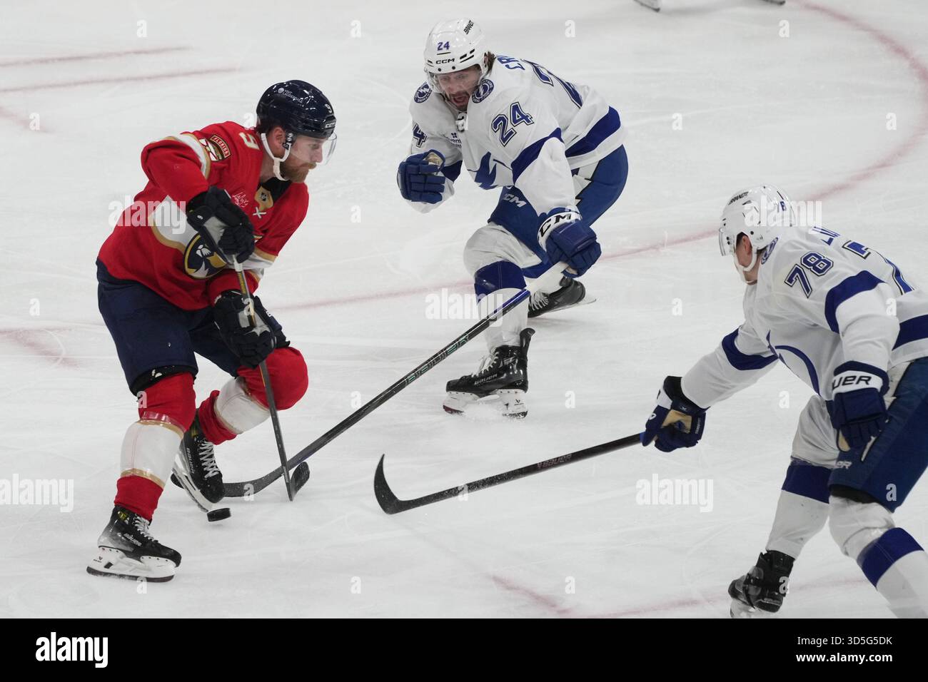 Tampa Bay Lightning defenseman Max Crozier (24) and defenseman Emil ...