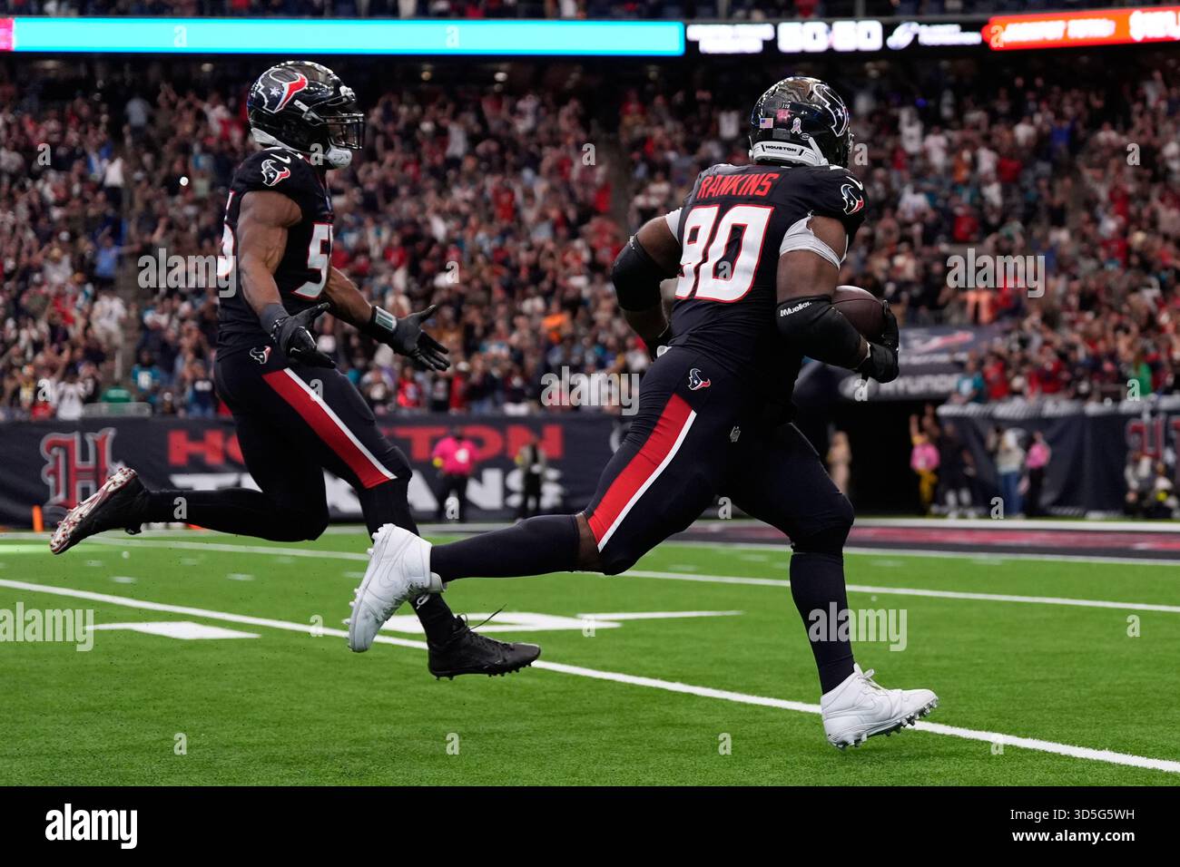 Houston Texans defensive tackle Sheldon Rankins (90) runs to the end ...