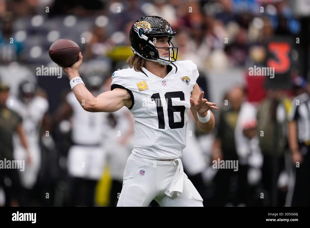 Jacksonville Jaguars quarterback Trevor Lawrence (16) throws during an ...