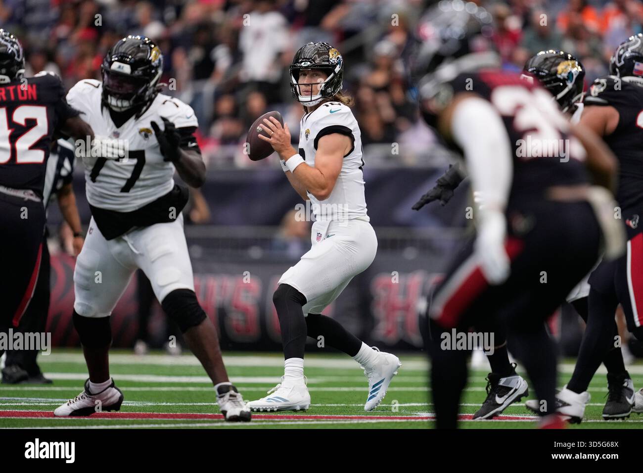 Jacksonville Jaguars quarterback Trevor Lawrence (16) throws during an ...