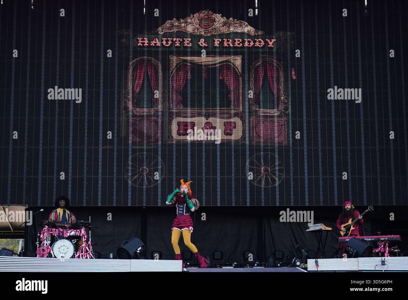 Michelle Buzz, center, singer of the U.S. band Haute & Freddy, performs ...