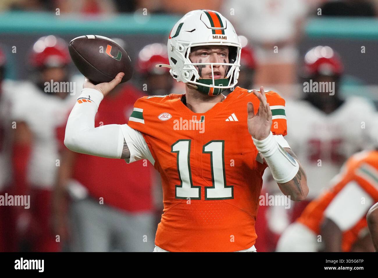 Miami quarterback Carson Beck (11) throws during the second half of an ...