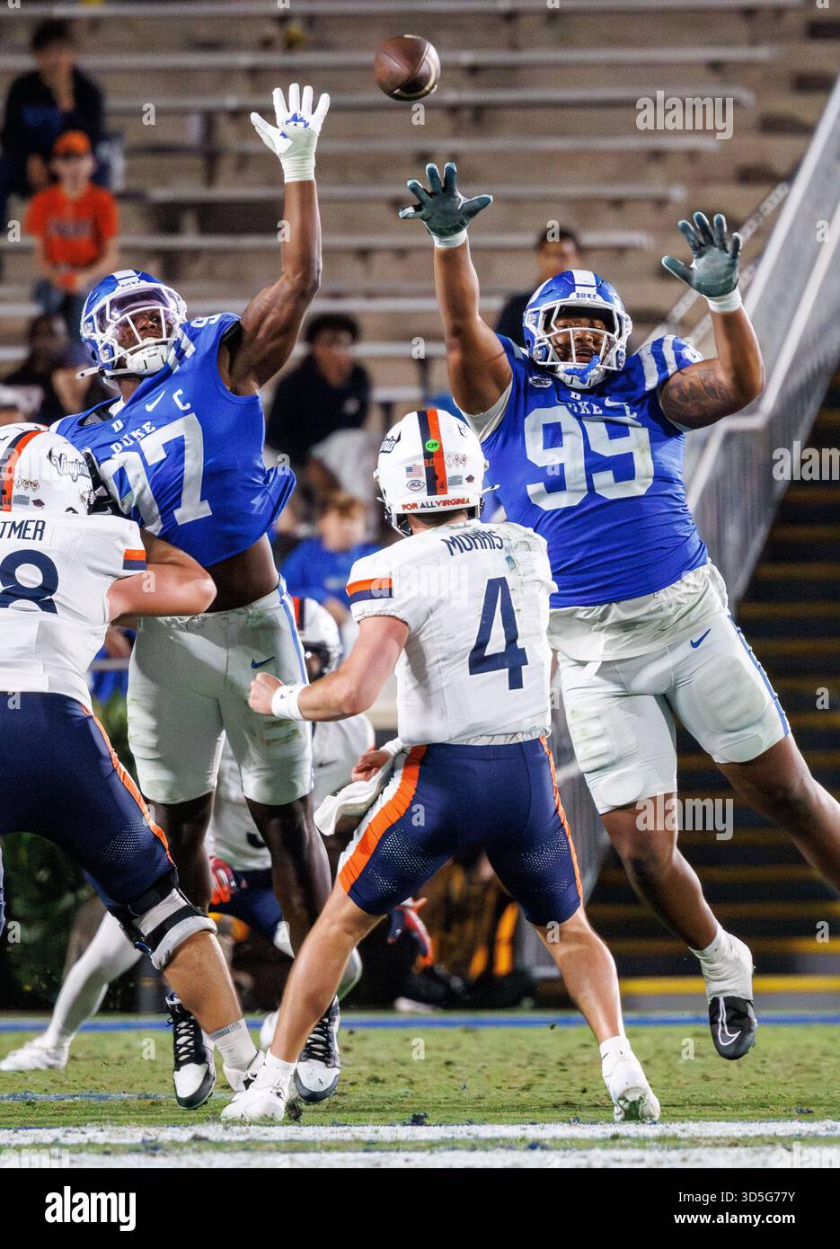 Virginia's Chandler Morris (4) throws over Duke's Wesley Williams (97 ...