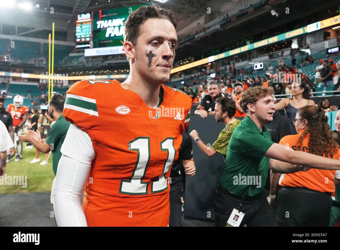 Miami quarterback Carson Beck (11) walks off the field after Miami ...
