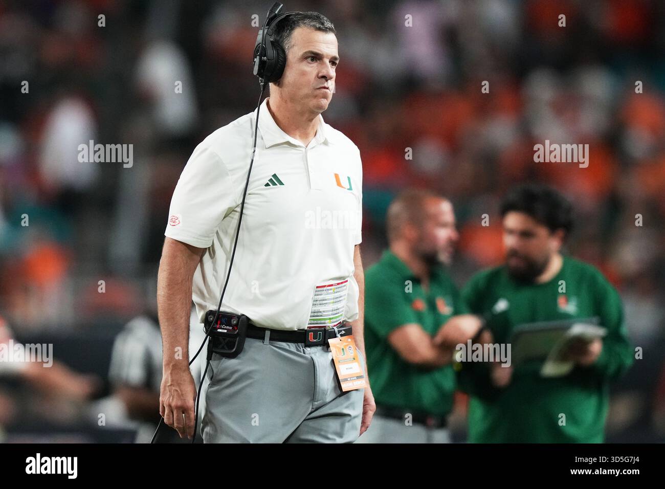 Miami head coach Mario Cristobal walks on the sideline during the ...