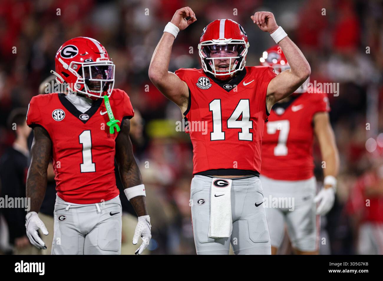 Georgia quarterback Gunner Stockton (14) reacts during pregame warmups ...