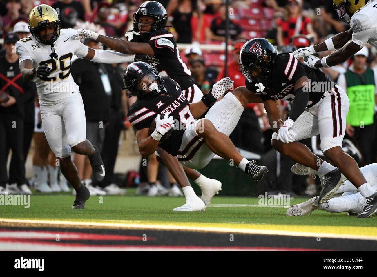 Texas Tech running back Cameron Dickey (8) runs the ball against ...