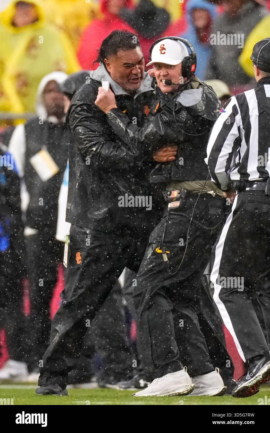 Southern California head coach Lincoln Riley, right, celebrates with ...