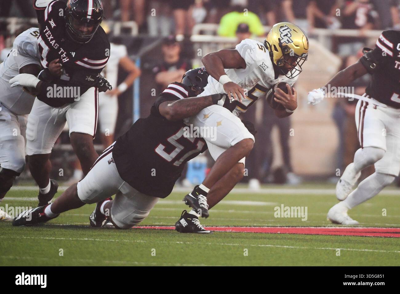Central Florida running back Jaden Nixon (5) is tackled by Texas Tech ...